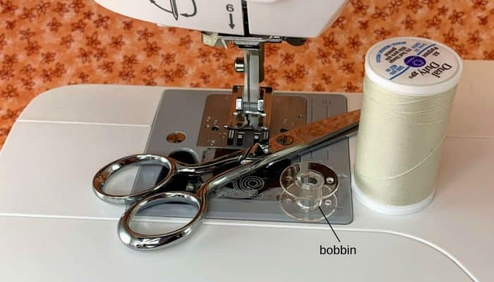 How to Wind a Bobbin on Your Sewing Machine - The Ruffled Purse®