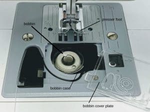 How to Insert a Bobbin in Your Sewing Machine - The Ruffled Purse®