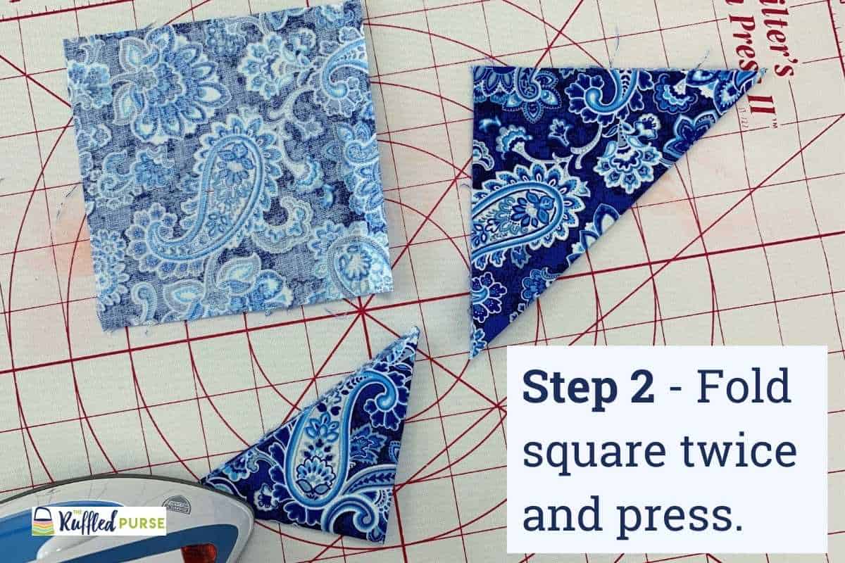 Hang Quilts with Triangles - The Ruffled Purse®